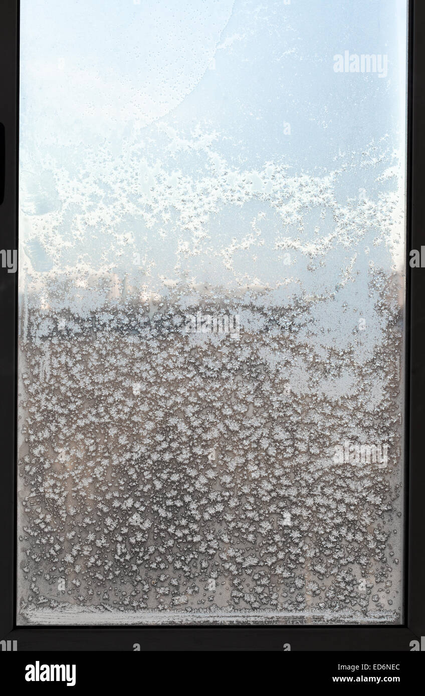 view of urban houses through frozen window in cold winter day Stock ...