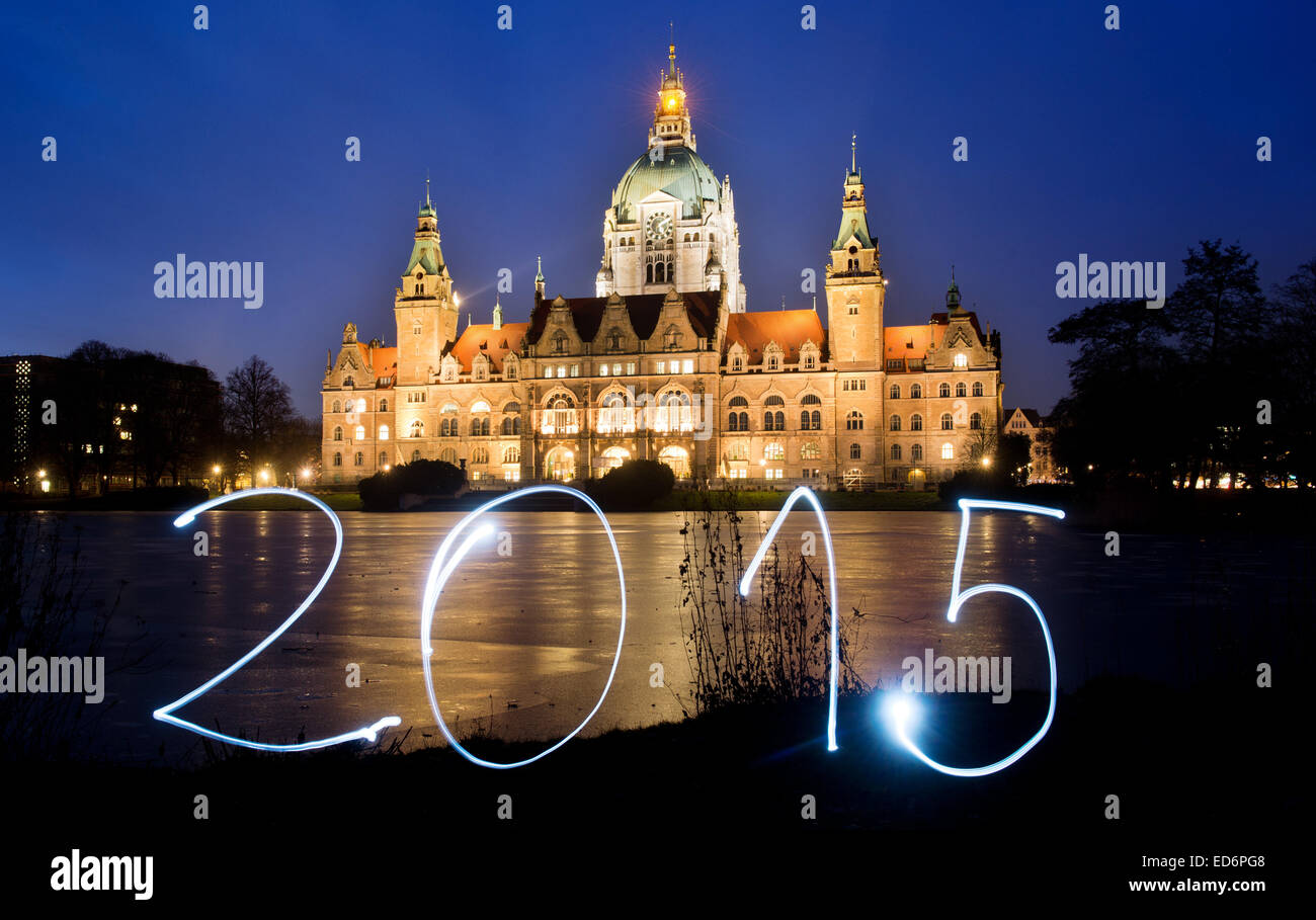 ILLUSTRATION - The number '2015' is written into the air using a ...