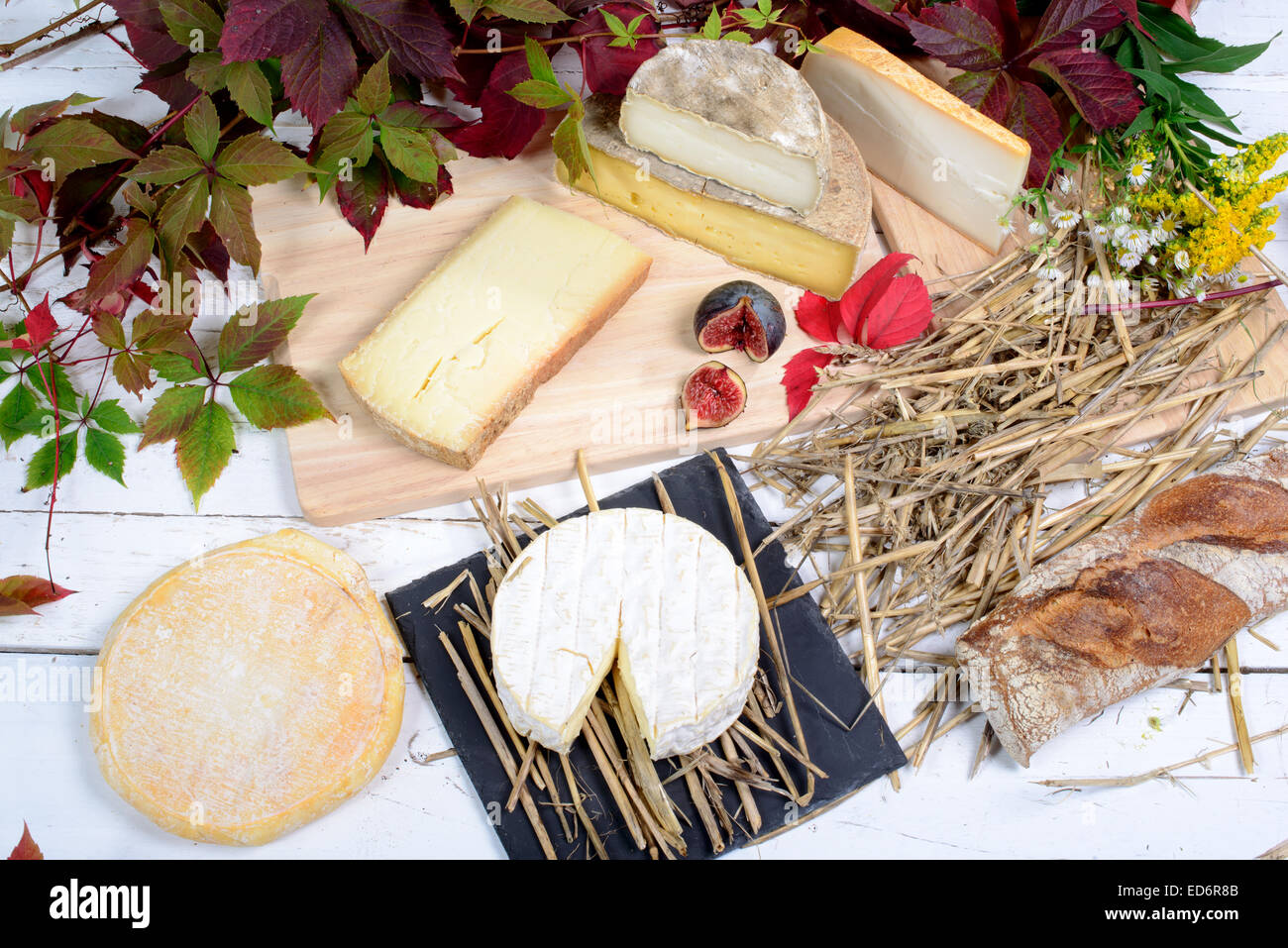 french cheese platter on the wooden table Stock Photo - Alamy