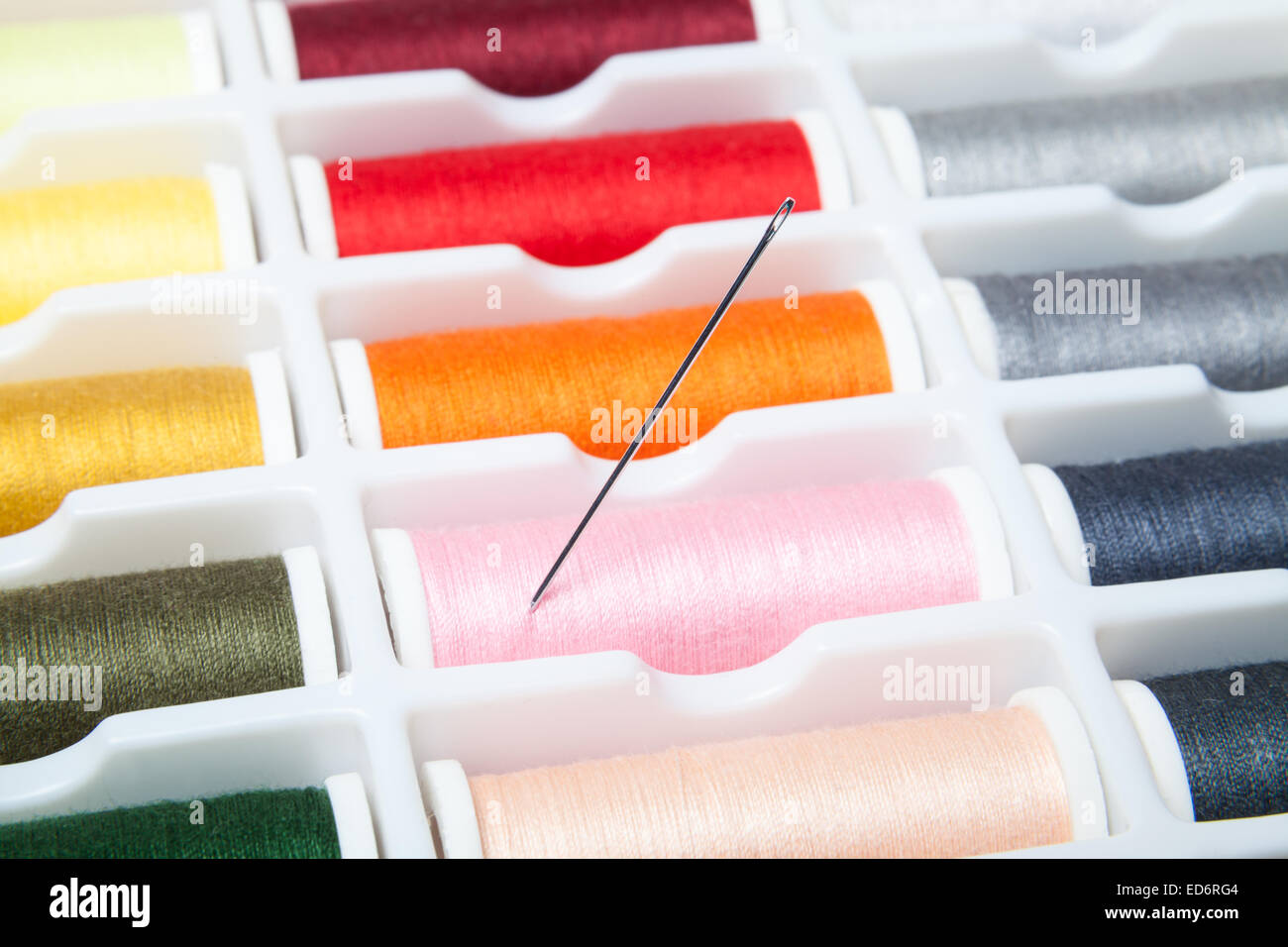 Sew threads hi-res stock photography and images - Alamy