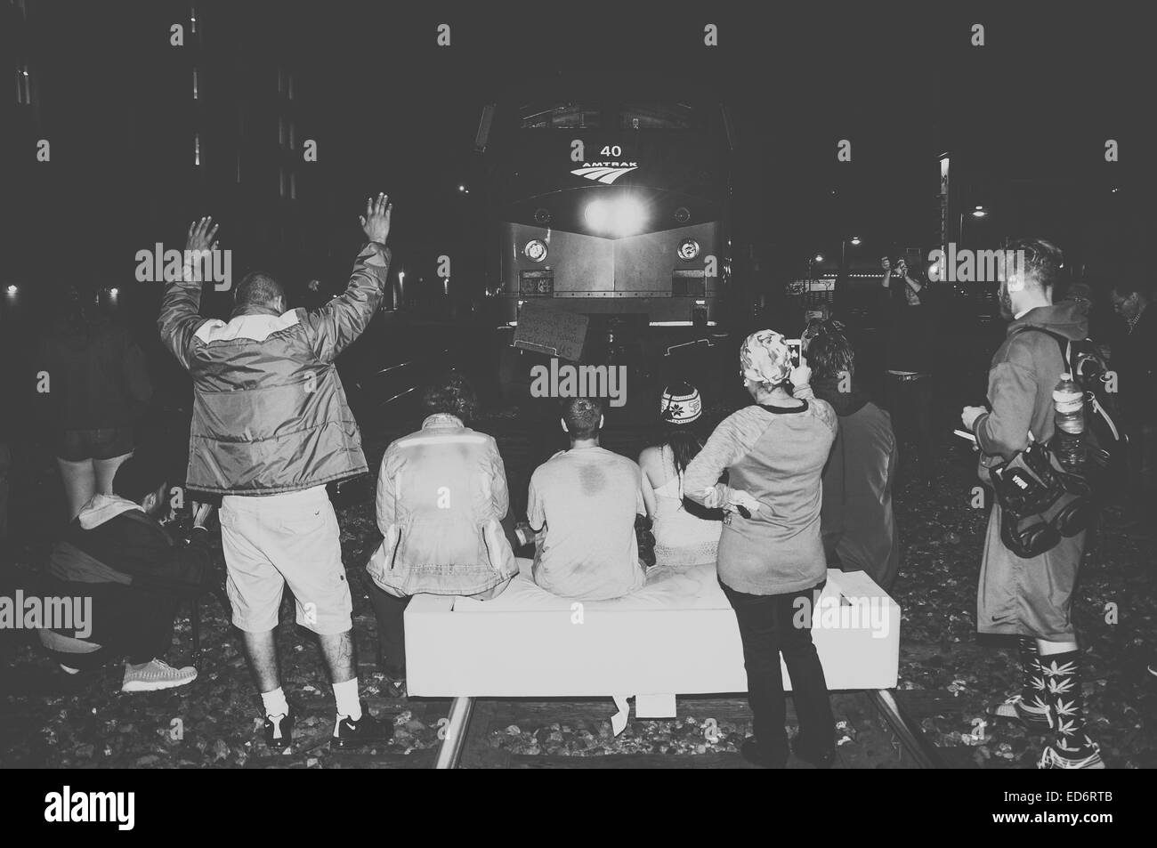 Protesters block an Amtrak train in Berkeley California during the ...