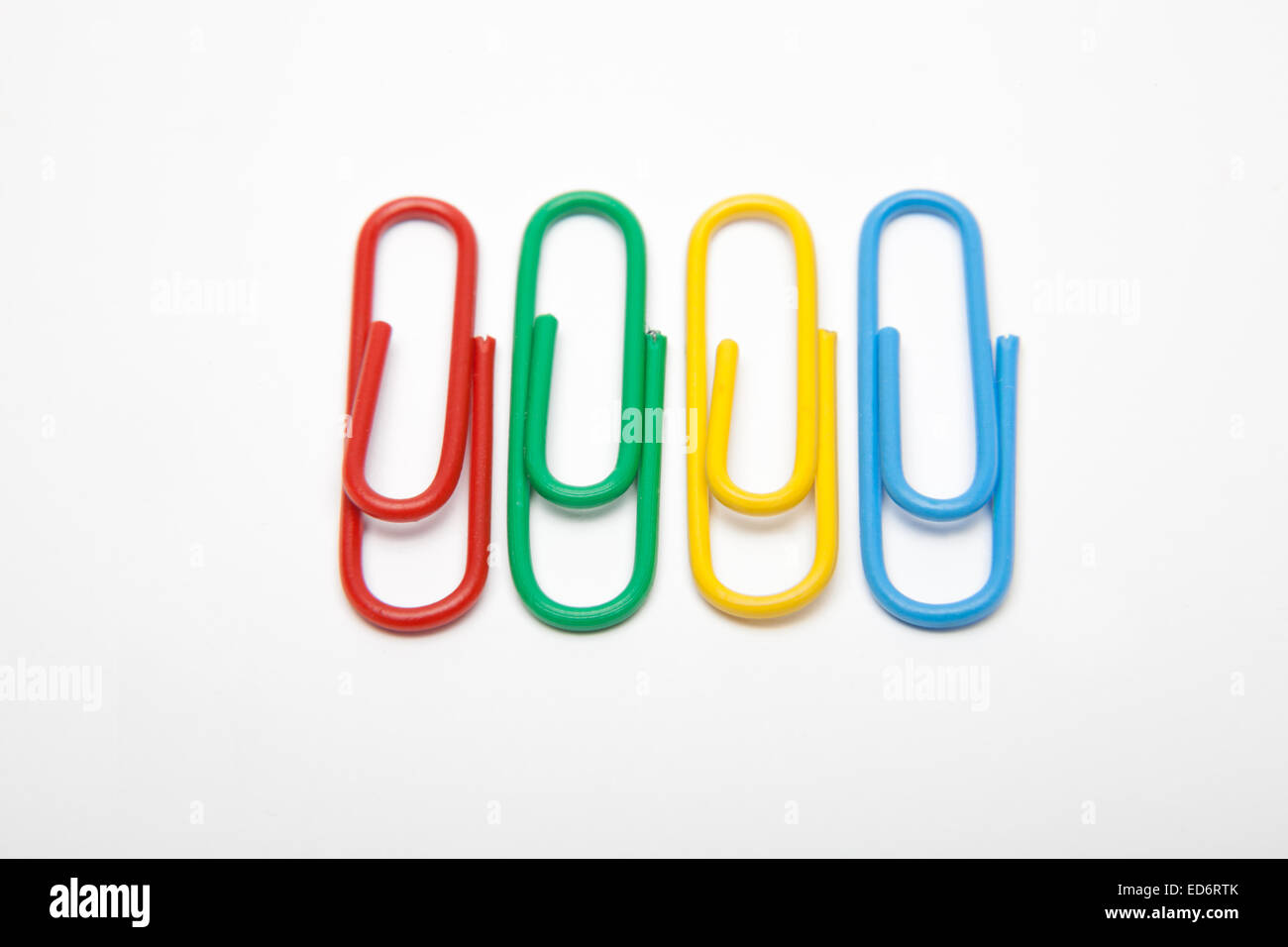 paper clips in different colors isolated Stock Photo - Alamy