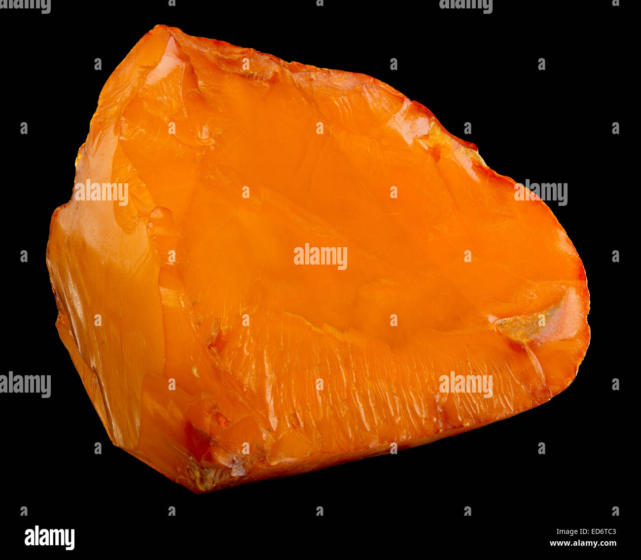 Orange amber isolated on black background Stock Photo - Alamy