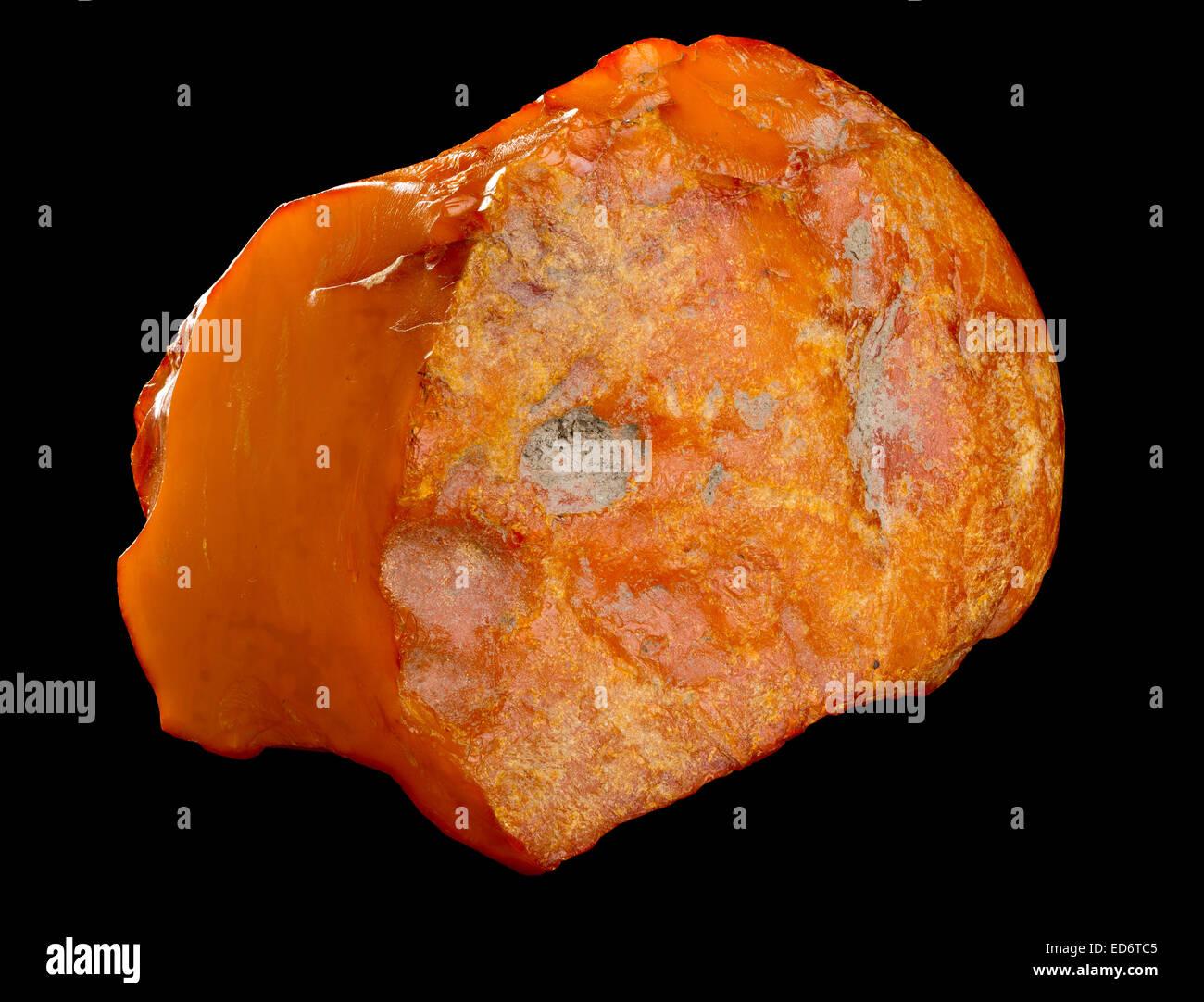 Orange amber isolated on black background Stock Photo - Alamy
