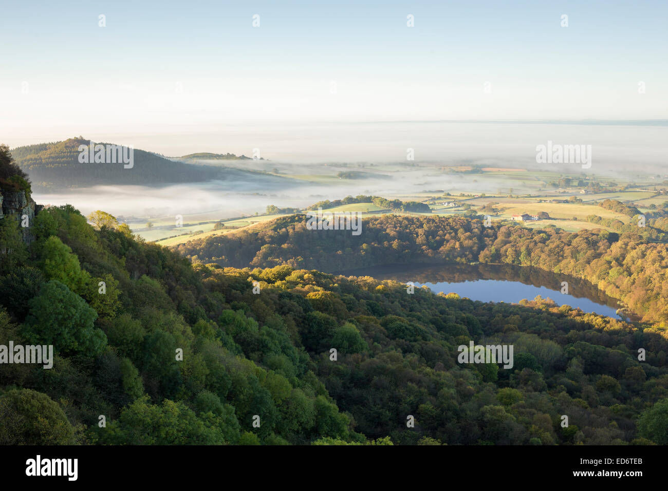 View from above Gormire lake across the Vale of York from Sutton Bank ...