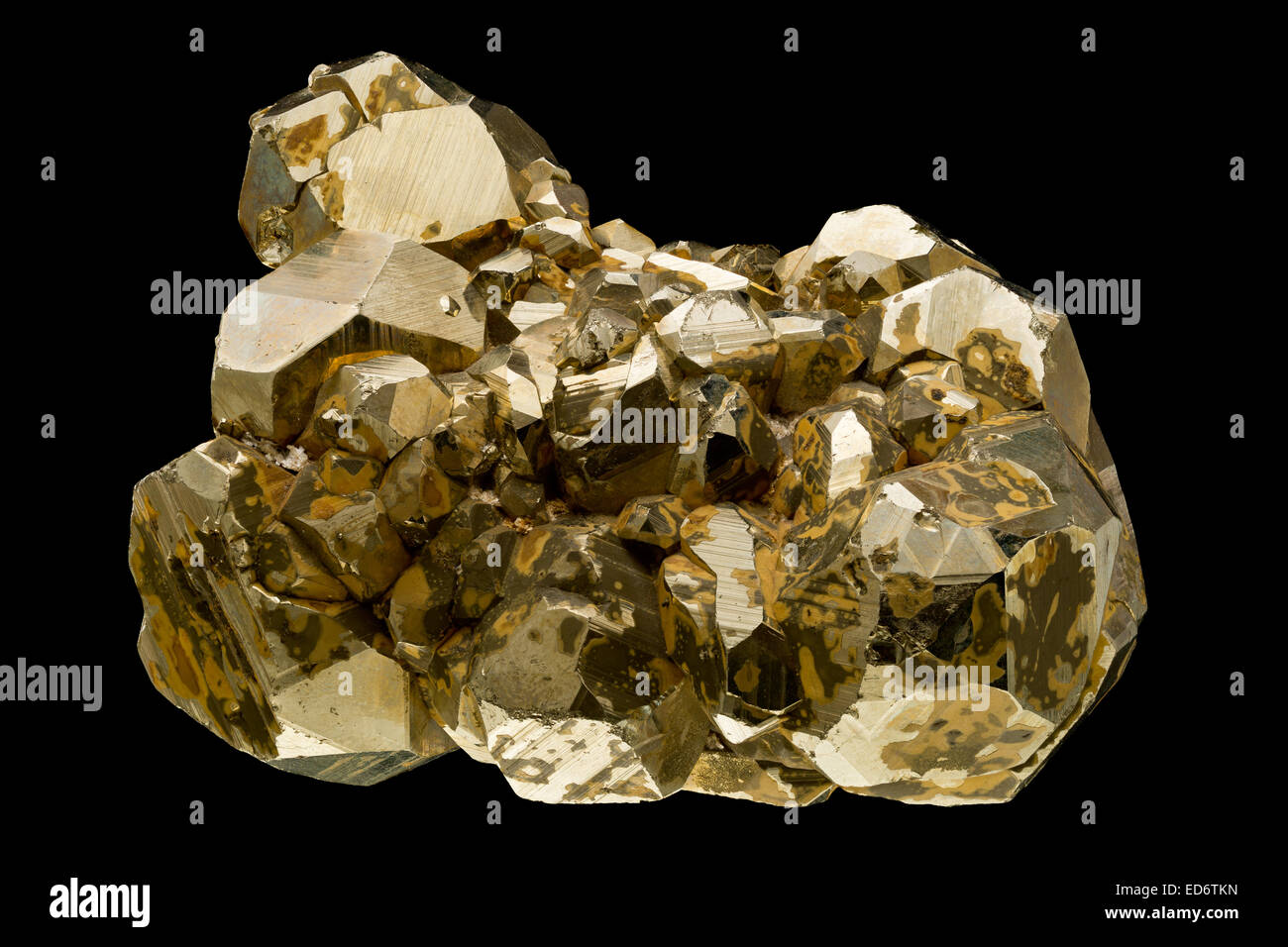 Pyrite (FeS2) crystals isolated on black background Stock Photo - Alamy