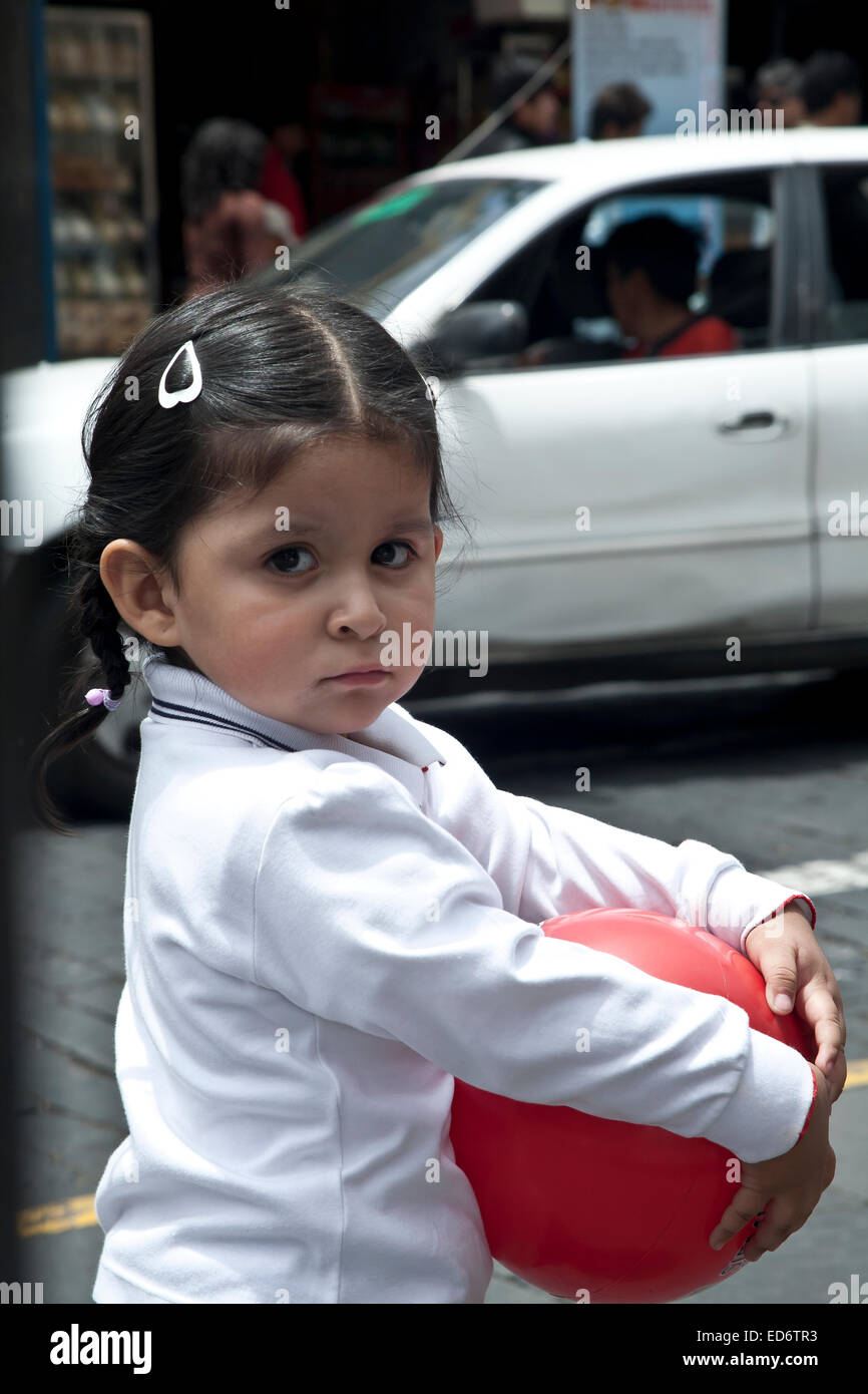Street portrait of little girl in Lima, Peru Stock Photo - Alamy