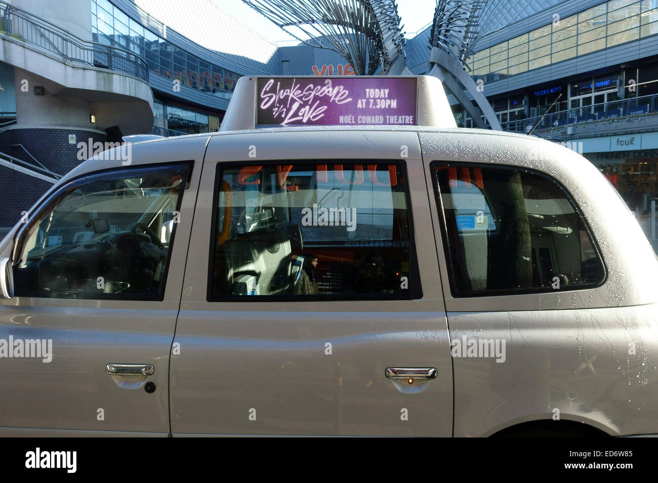 Advertising display panel on roof of London taxi cab, London Stock ...