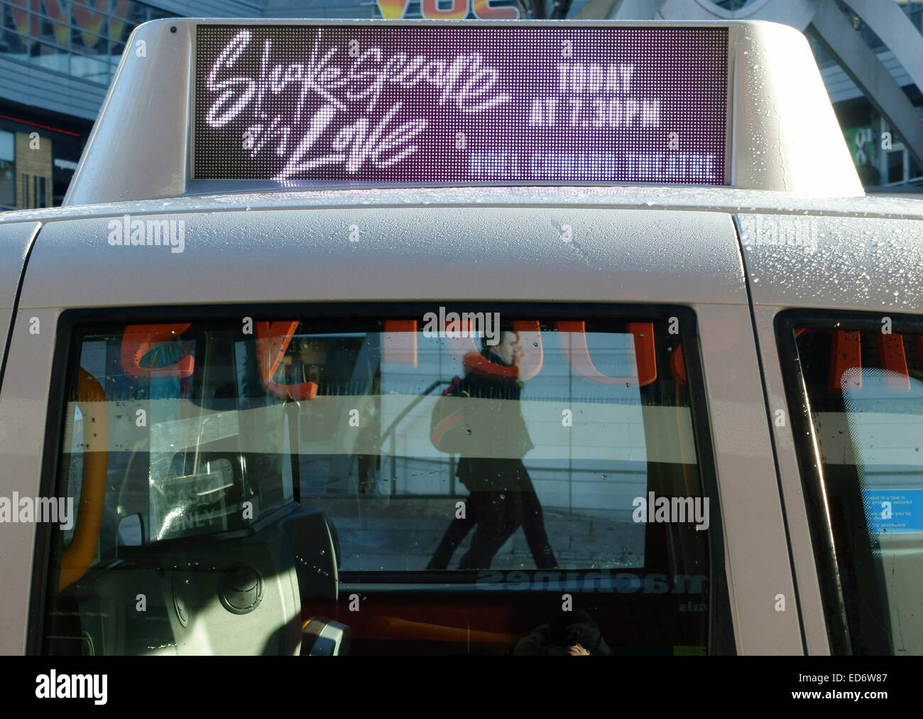 Advertising display panel on roof of London taxi cab, London Stock ...