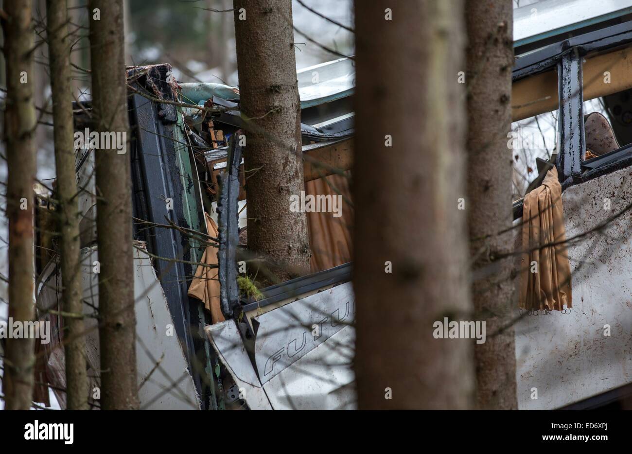 Bad Hersfeld, Germany. 30th Dec, 2014. A fully destroyed coach lies on ...