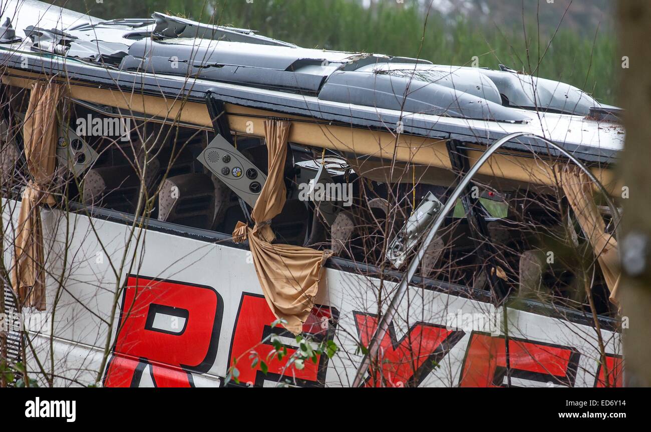 Bad Hersfeld, Germany. 30th Dec, 2014. A fully destroyed coach lies on ...