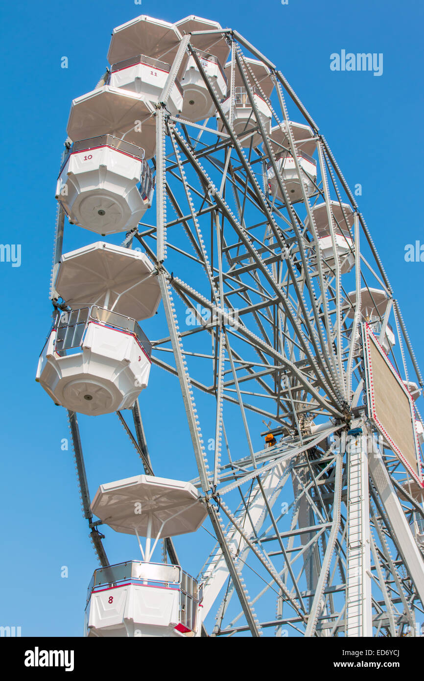 white ferris wheel against blue sky background Stock Photo - Alamy