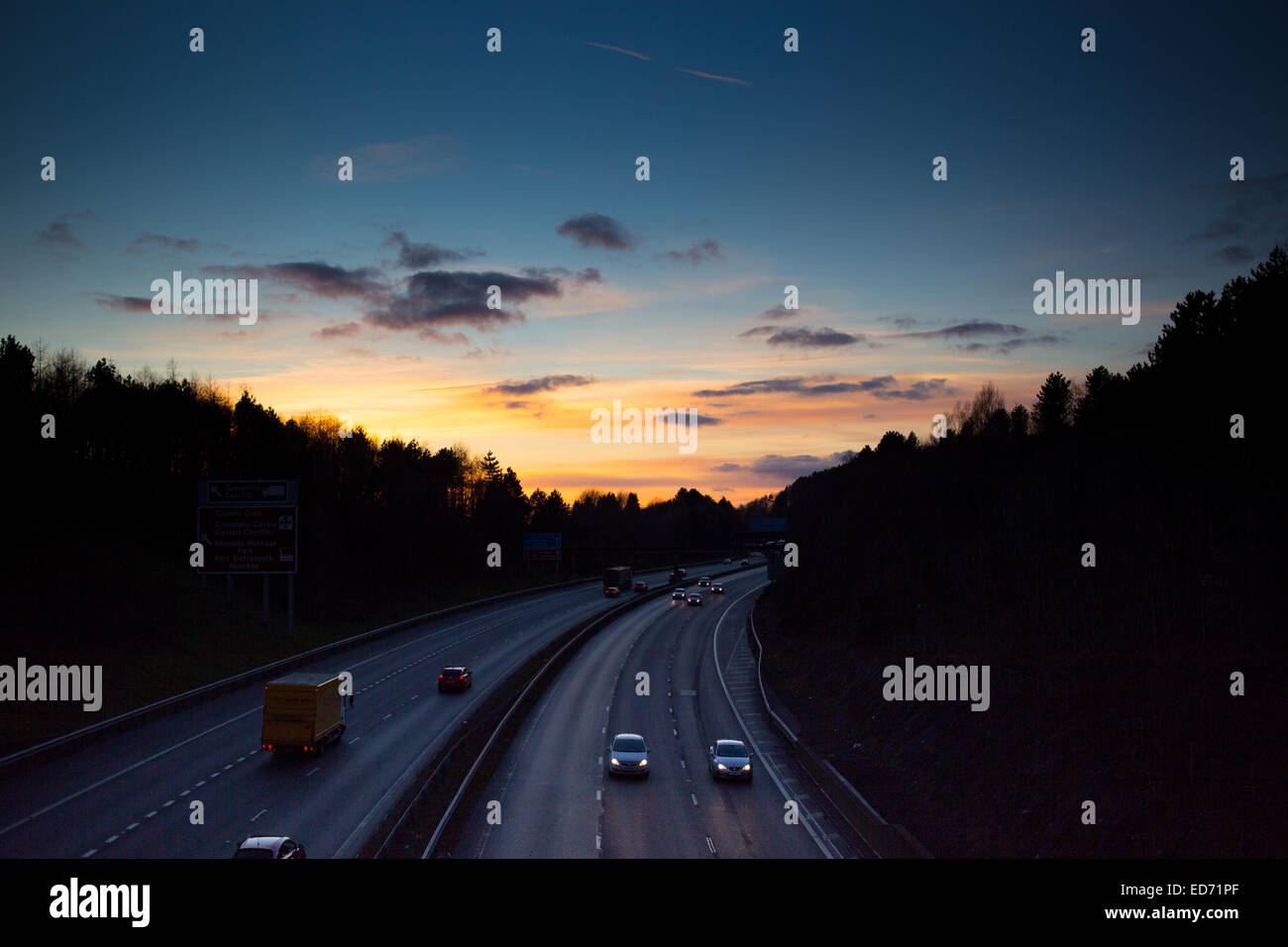 Cars on the M4 motorway at sunset Stock Photo - Alamy