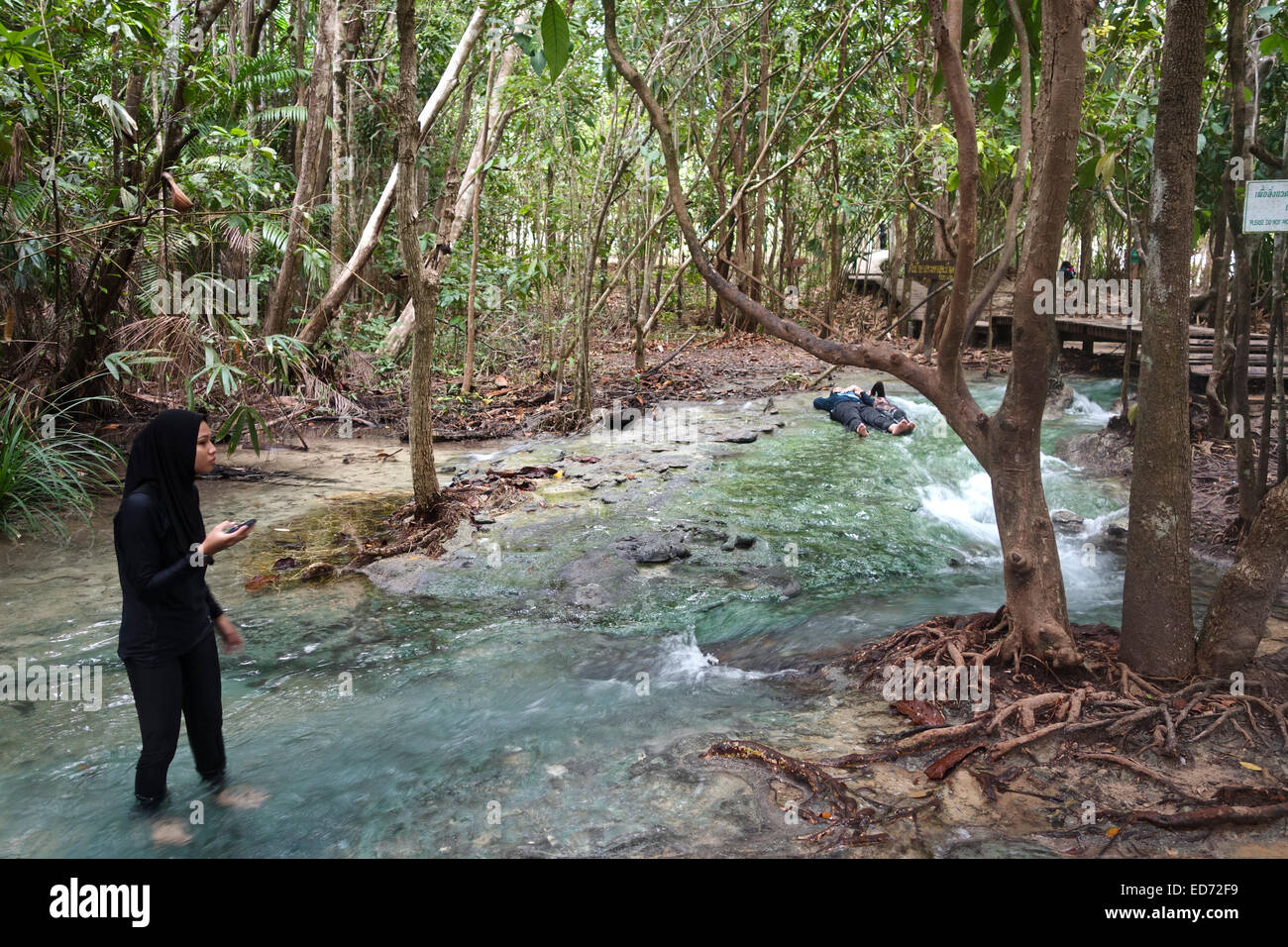 Some people in warm water streams Sra Morakot nature reserve Emerald ...