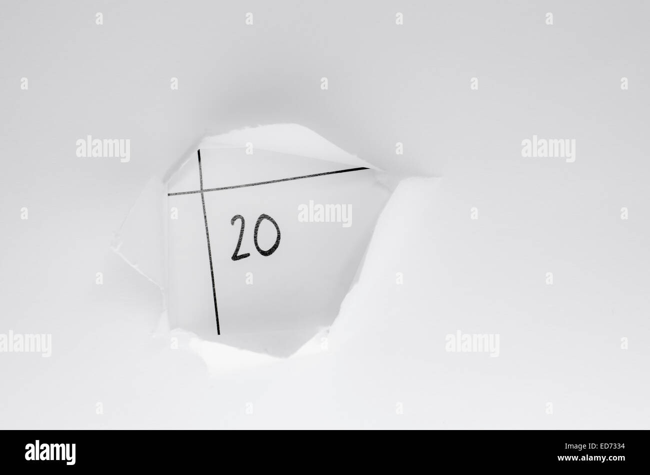 numbers seen through white ripped paper Stock Photo - Alamy