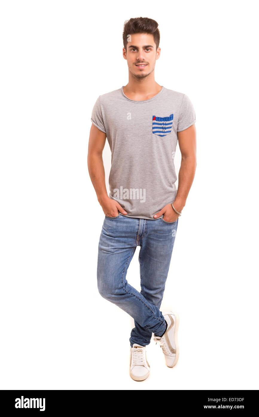 Studio picture of a young and handsome man posing isolated Stock Photo ...