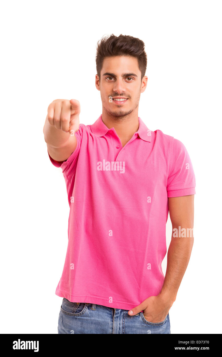 Handsome young man pointing at you, isolated over white background ...