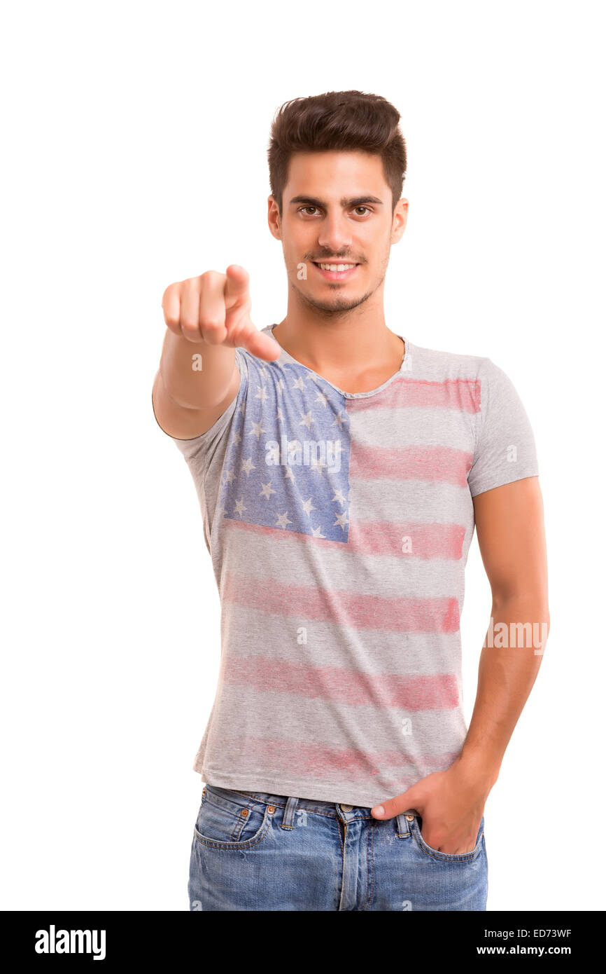 Handsome young man pointing at you, isolated over white background ...