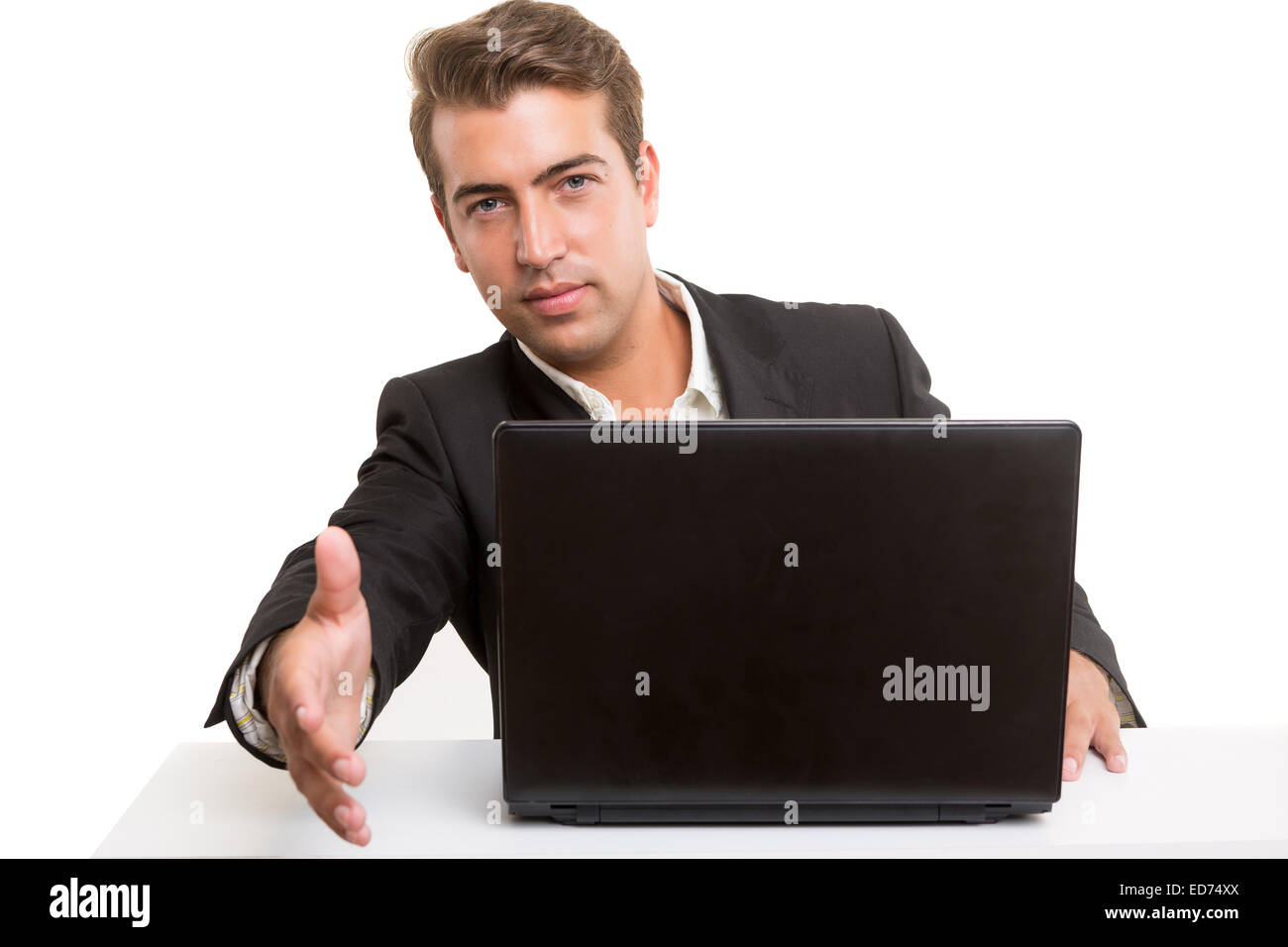 Young business man offering handshake Stock Photo - Alamy