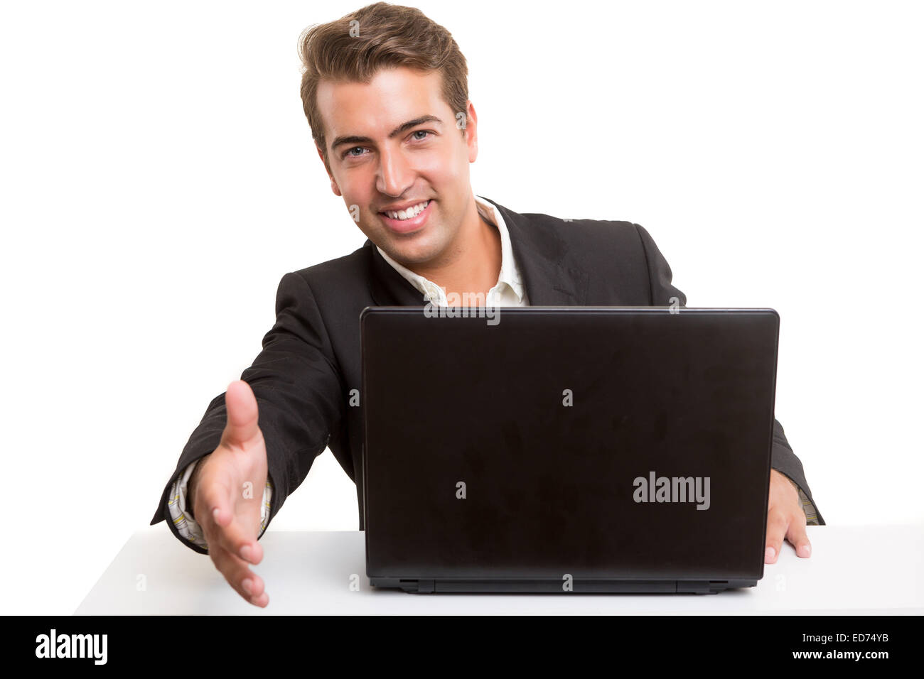 Young business man offering handshake Stock Photo - Alamy