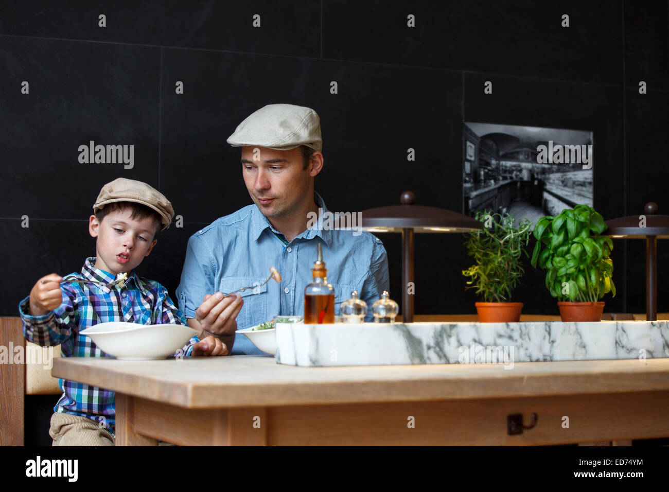 Father son having lunch together hi-res stock photography and images ...