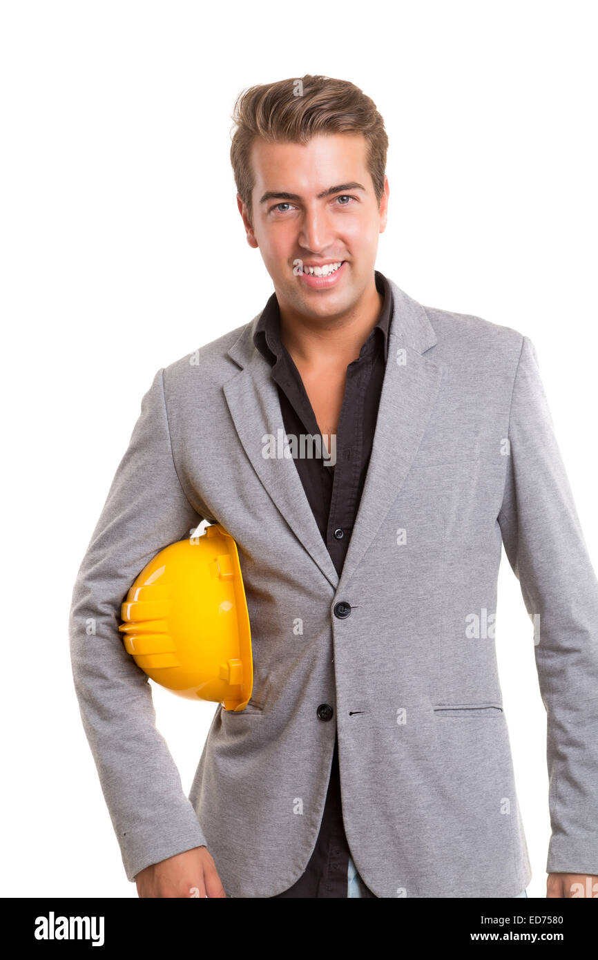 Handsome young engineer posing isolated over white background Stock ...