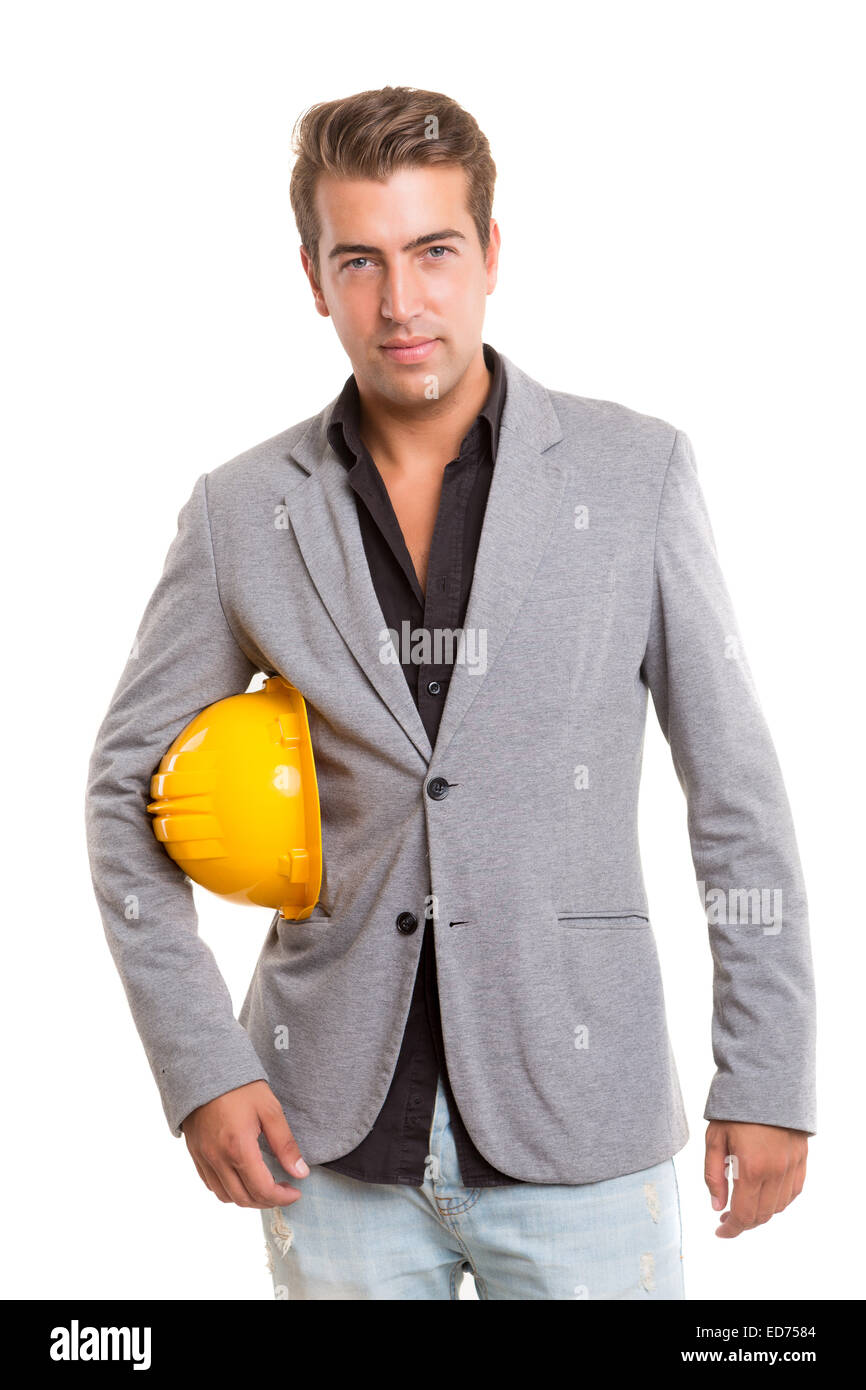 Handsome young engineer posing isolated over white background Stock ...