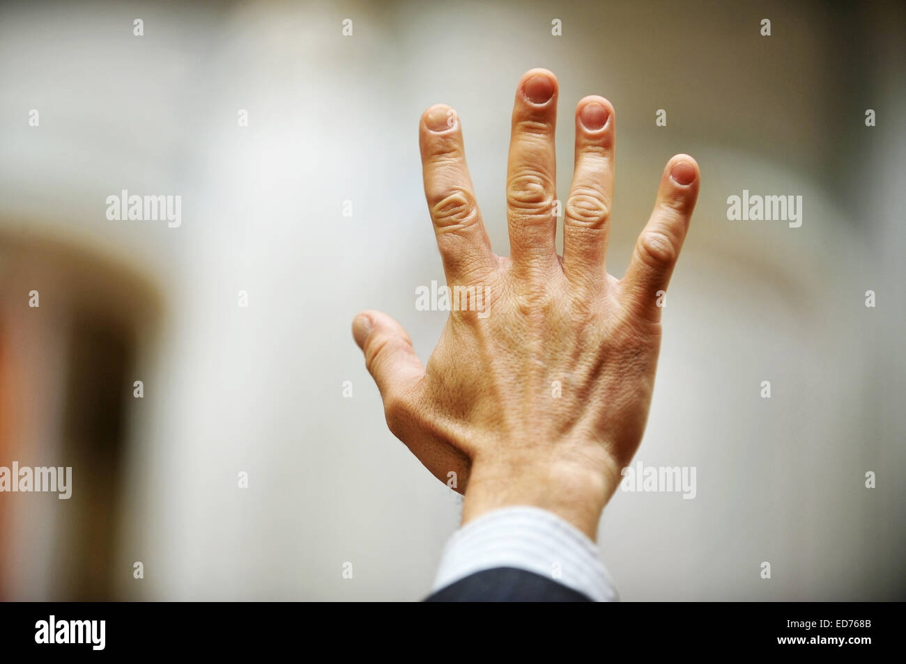 Raised palm hi-res stock photography and images - Alamy