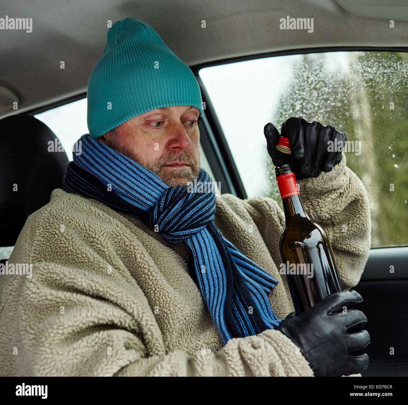 The driver, alcoholic man drinking in the car Stock Photo - Alamy