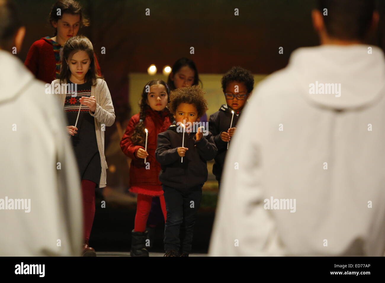 Prague, Czech Republic. 30th December 2014. Little children bring ...
