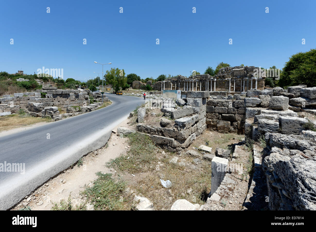 The modern road passes through the remains of the ancient gate. Side ...