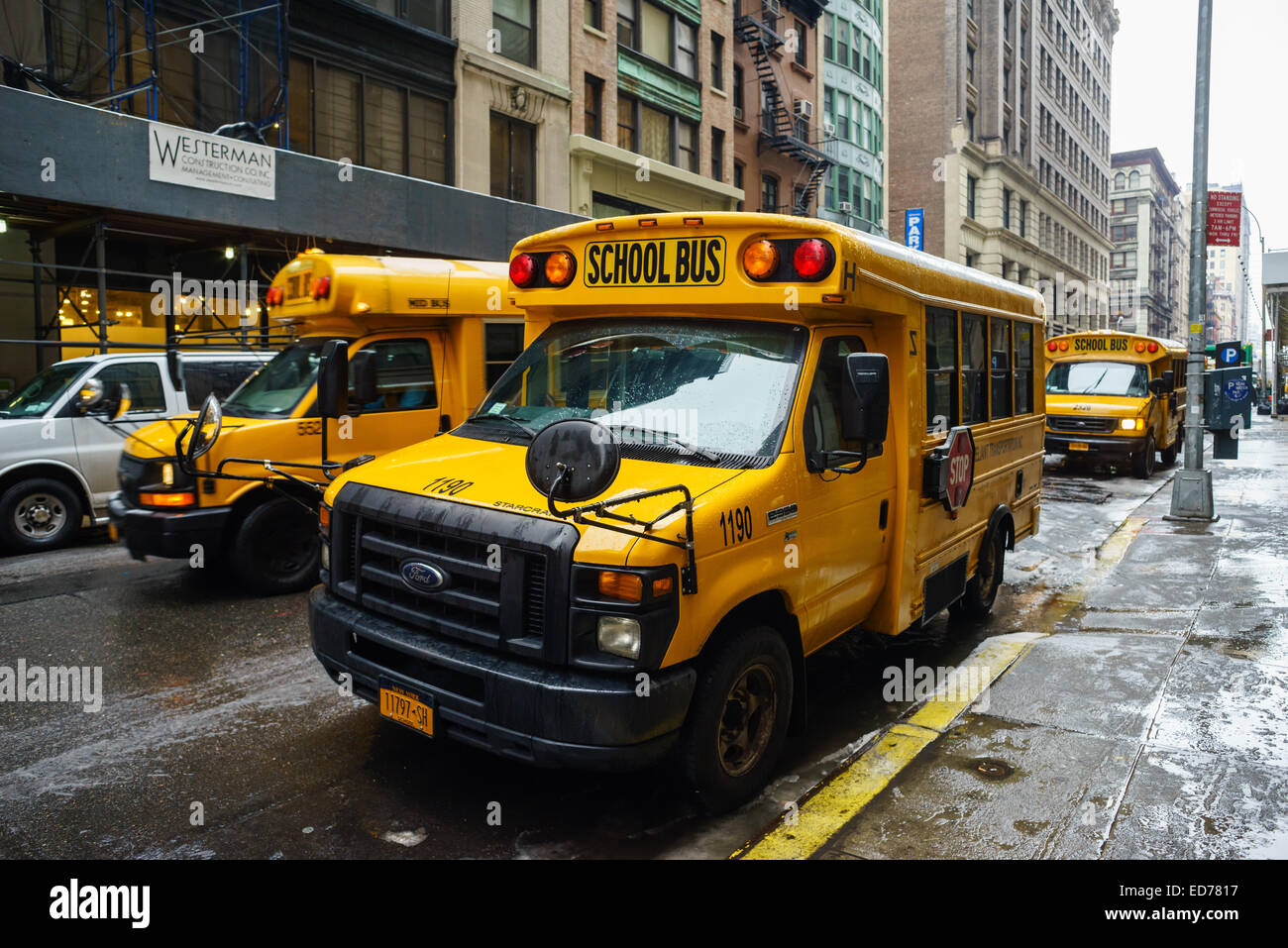 School buses waiting for students, on a busy Chelsea street Stock Photo ...