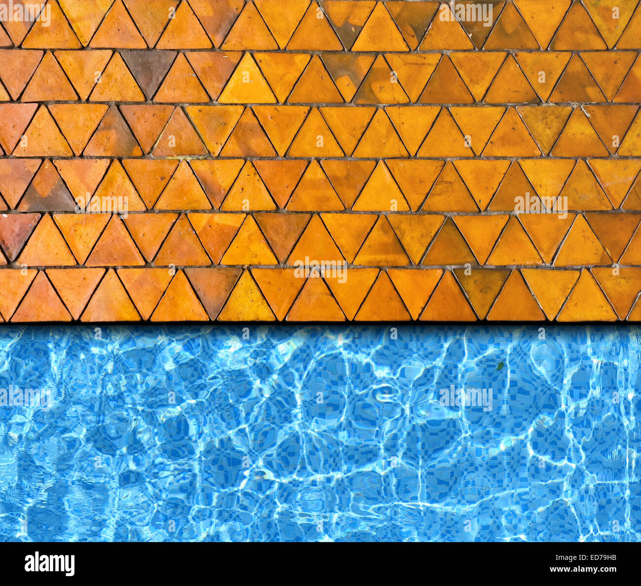 triangle stone pavement with pool background Stock Photo - Alamy