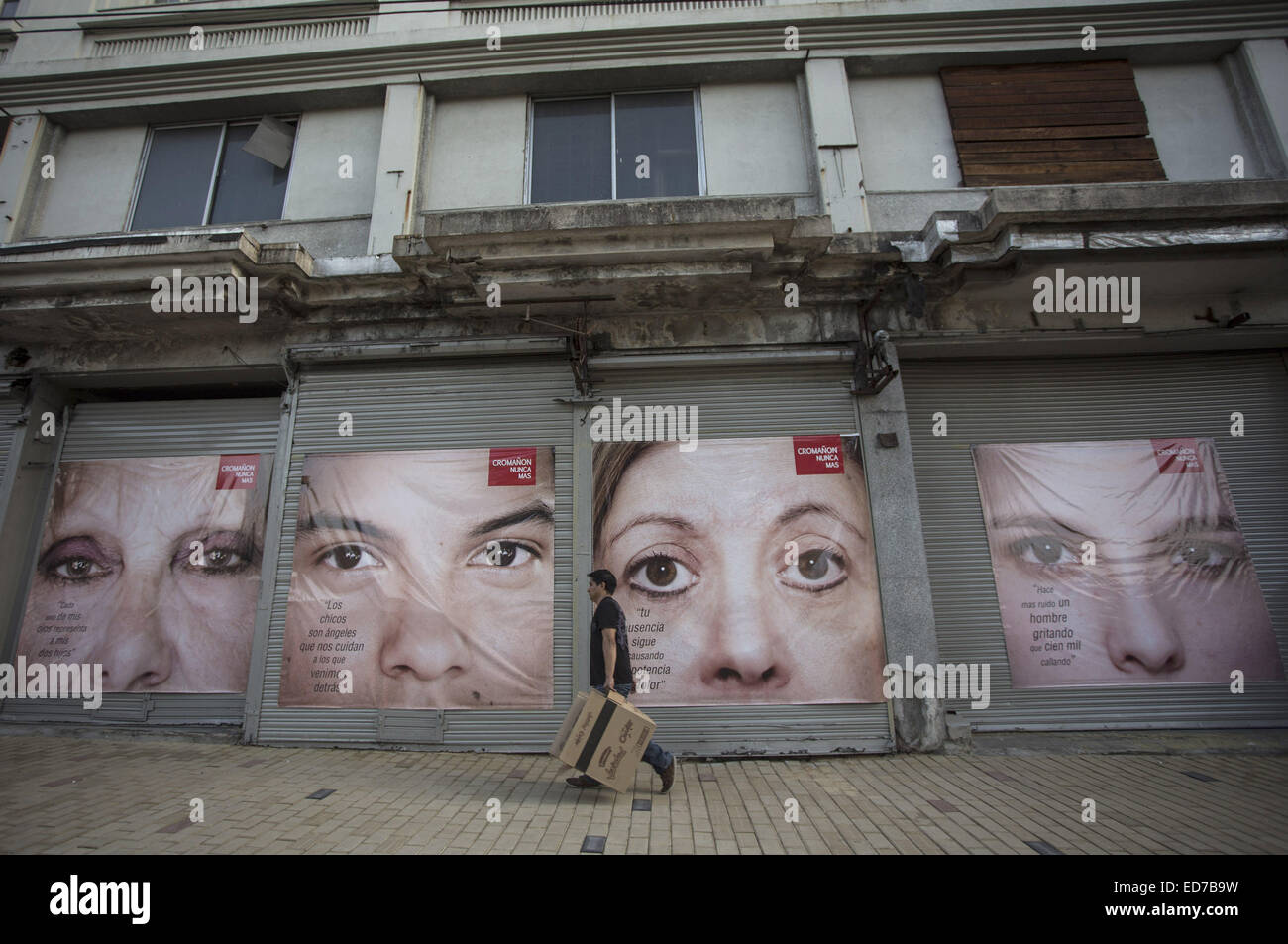 Buenos Aires, Argentina. 30th Dec, 2014. A man walks in front of the ...