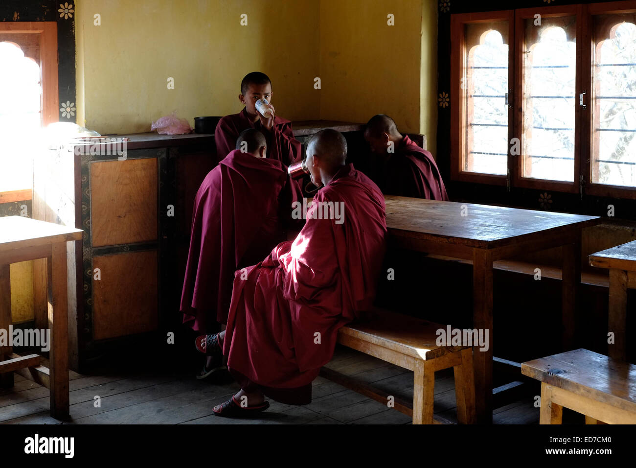Buddhist novices in the dining room of the Tamshing Lakhang temple ...