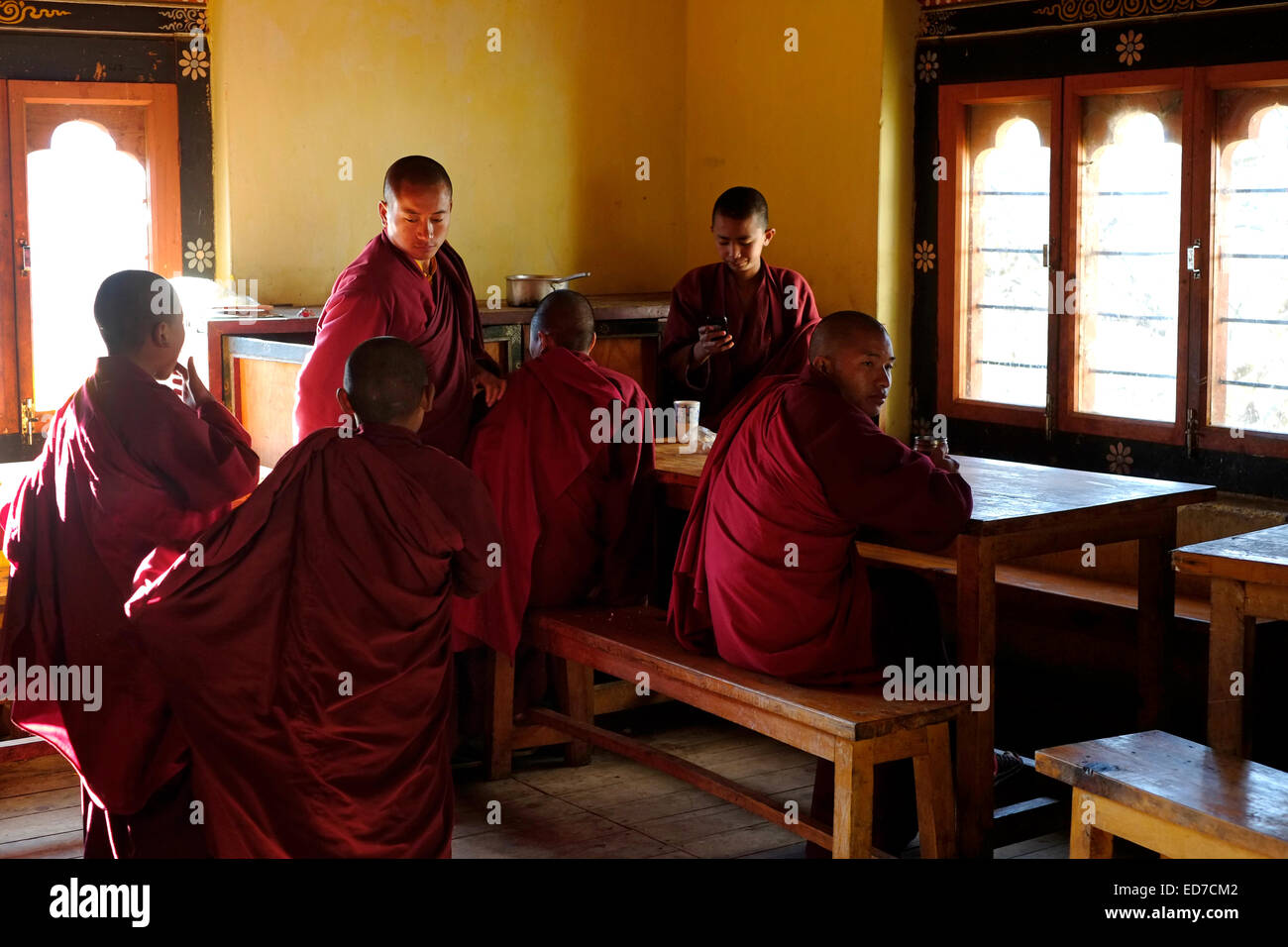 Buddhist novices in the dining room of the Tamshing Lakhang temple ...