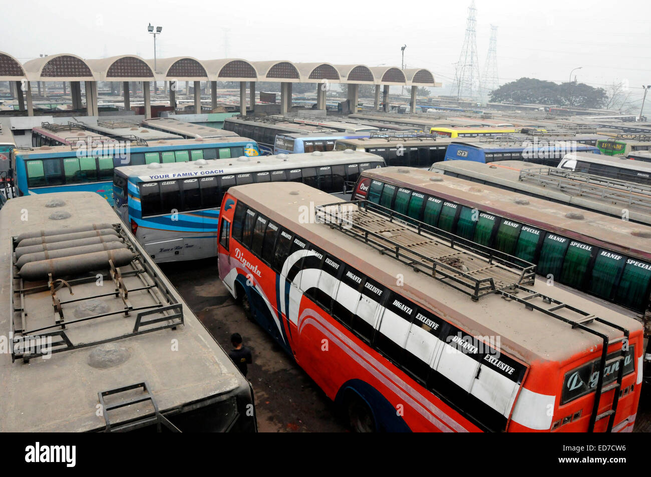 Dhaka, Bangladesh. 31st Dec, 2014. Long journey buses are parked in a ...