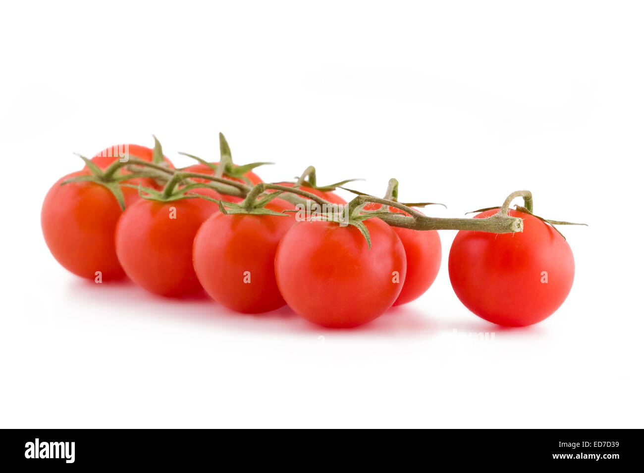 Bunch of fresh small cocktail tomatoes isolated on white Stock Photo ...