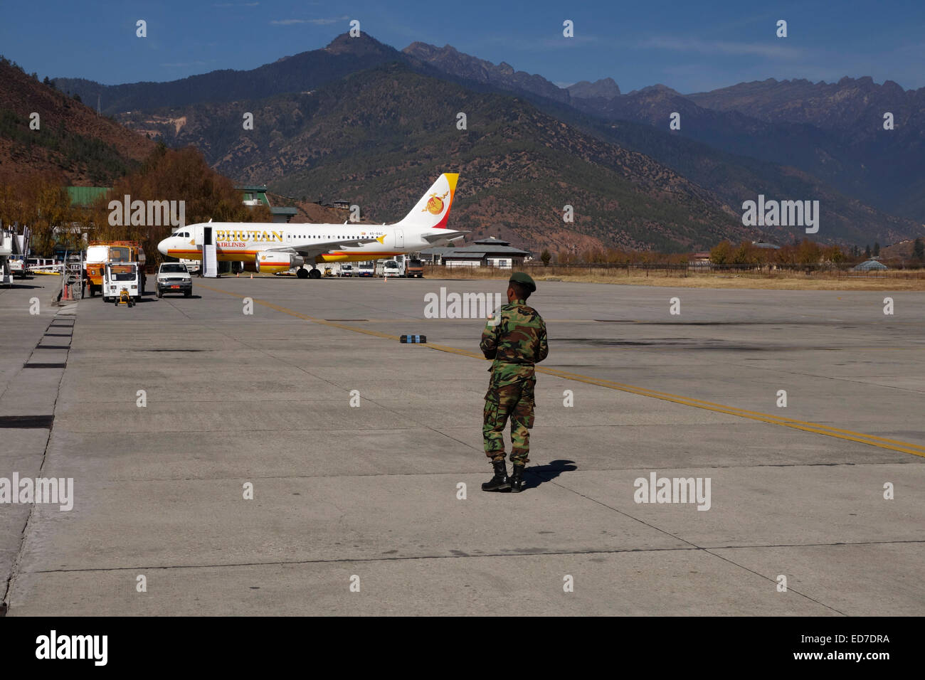 A soldier with Drukair national carrier of the Kingdom of Bhutan at the ...
