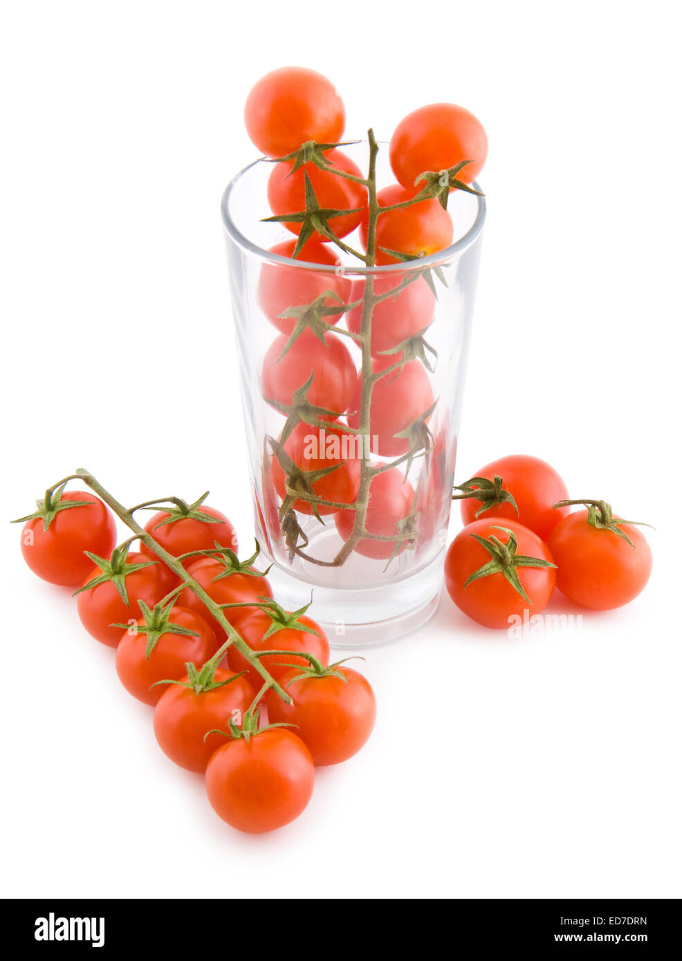 Small cocktail tomatoes in a glass isolated, fresh vegetables Stock ...
