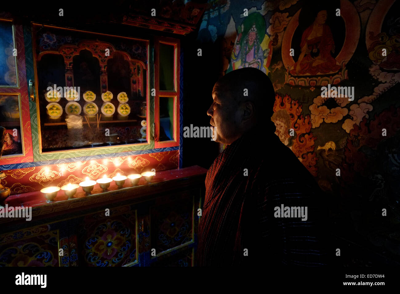 A Buddhist devotee inside the Tamshing Lakhang temple formally the ...