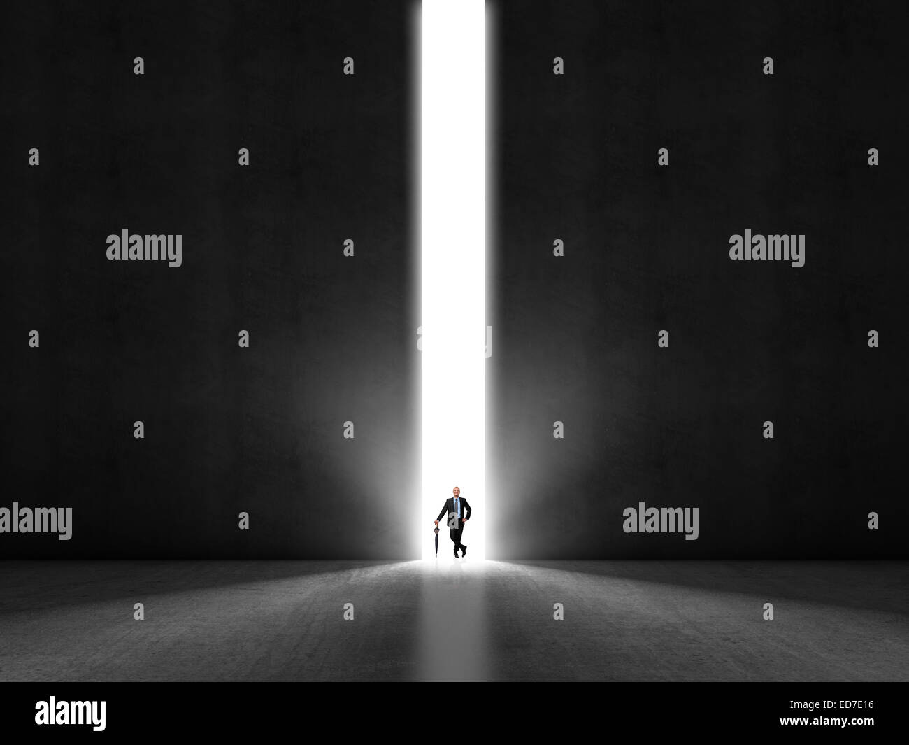 standing man and abstract huge gate Stock Photo - Alamy