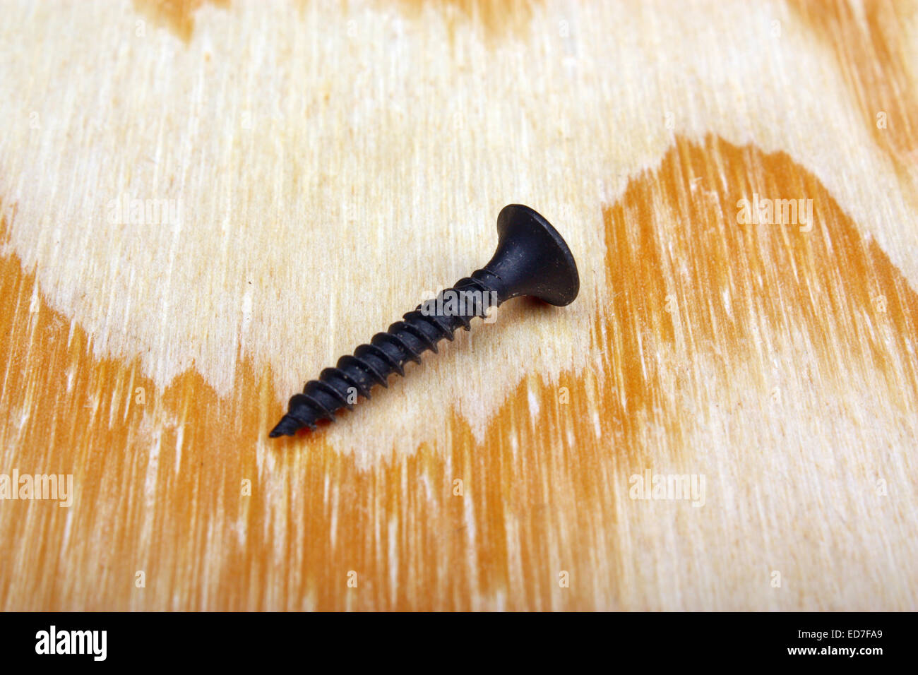 Screw construction for wood and metal on the wooden table Stock Photo ...