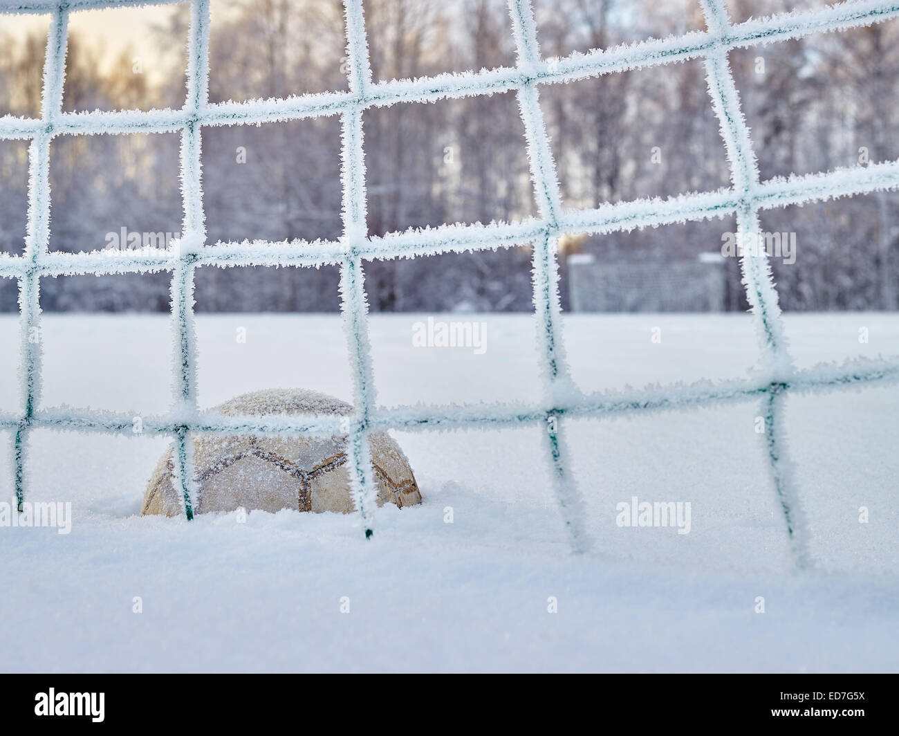 Snowy soccer field in December, frost and cold weather Stock Photo - Alamy