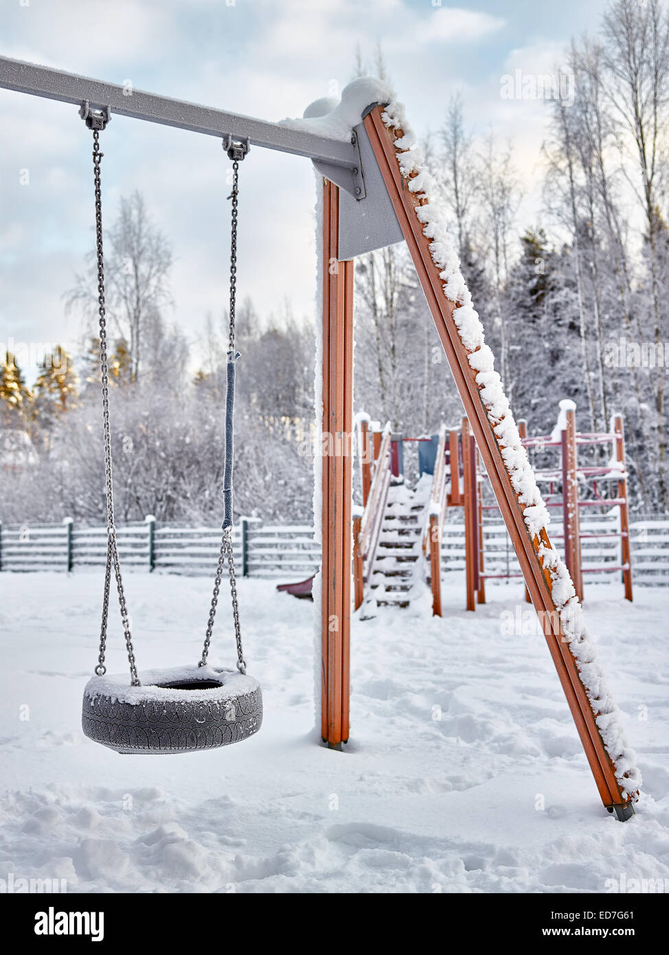 Snowy playground in December, frost and cold weather Stock Photo - Alamy
