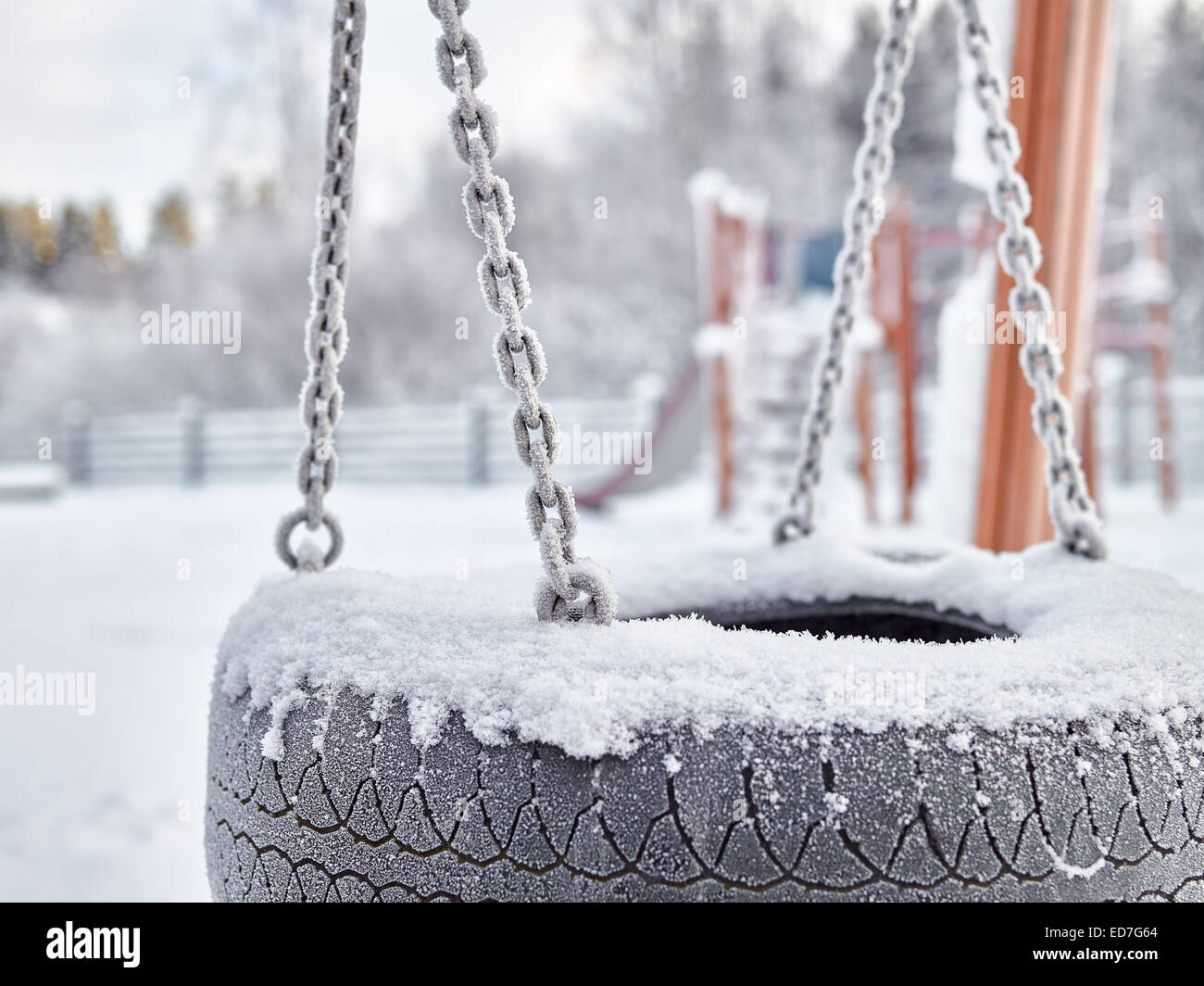 Close up, snowy playground in December, frost and cold weather Stock ...