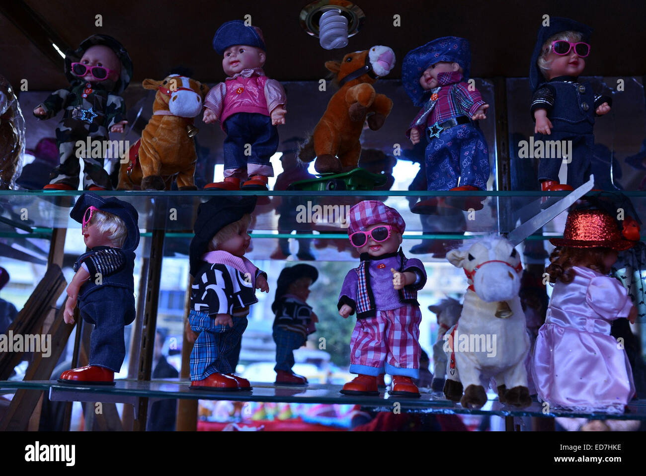 Cairo, Egypt. 29th Dec, 2014. Doll toys are displayed at a shop in ...