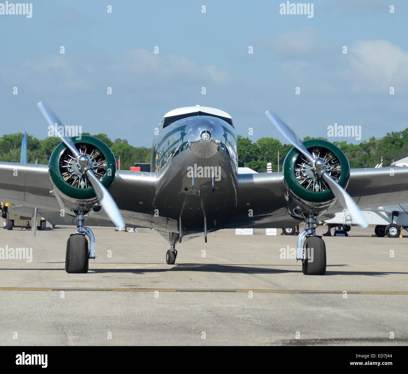 Retro propeller airplane front view on the ground Stock Photo - Alamy
