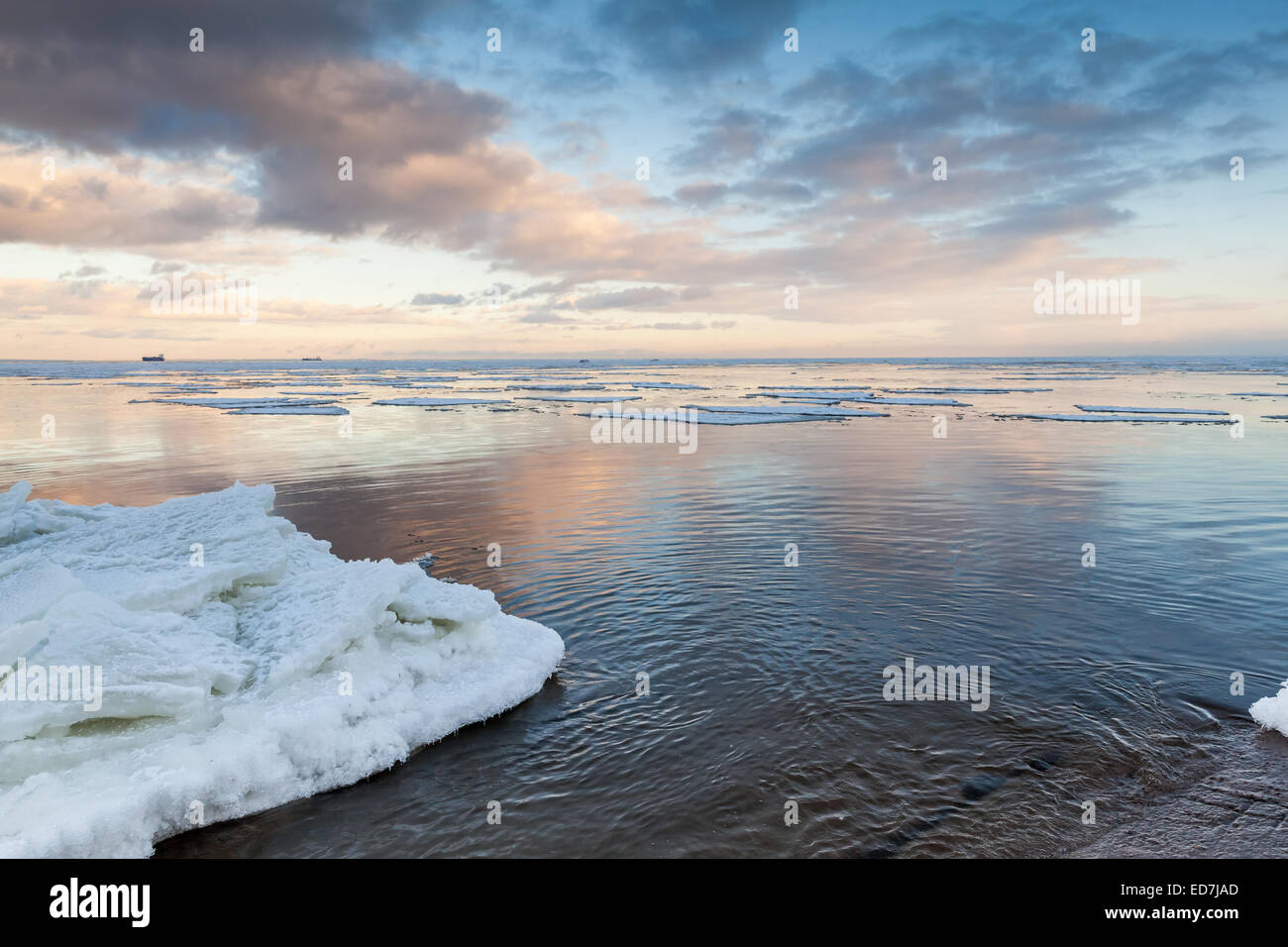 Winter coastal landscape with ice and snow on the beach. Gulf of ...