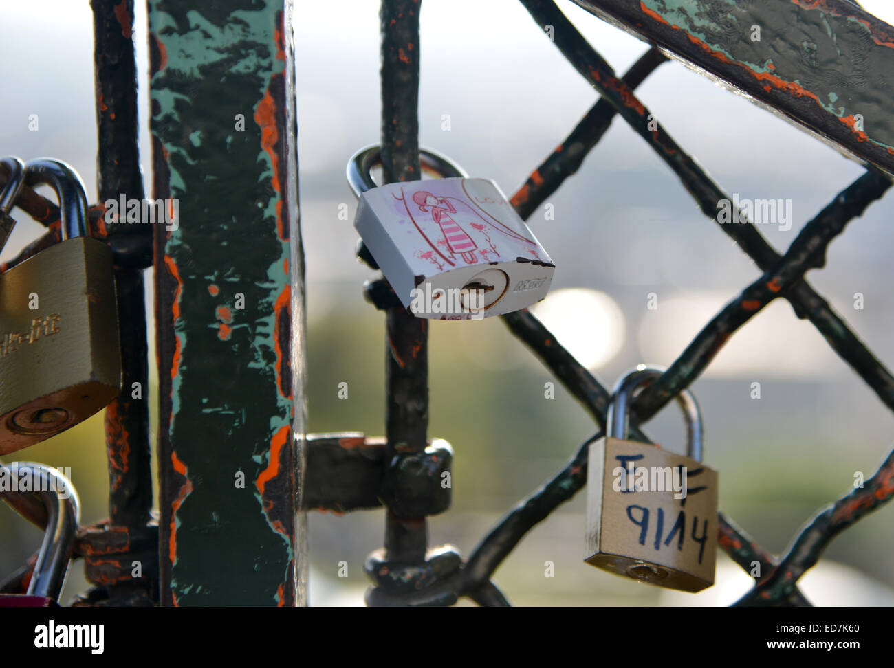 Love Locks, padlocks left by romantic couples on a fence at Montmatre ...